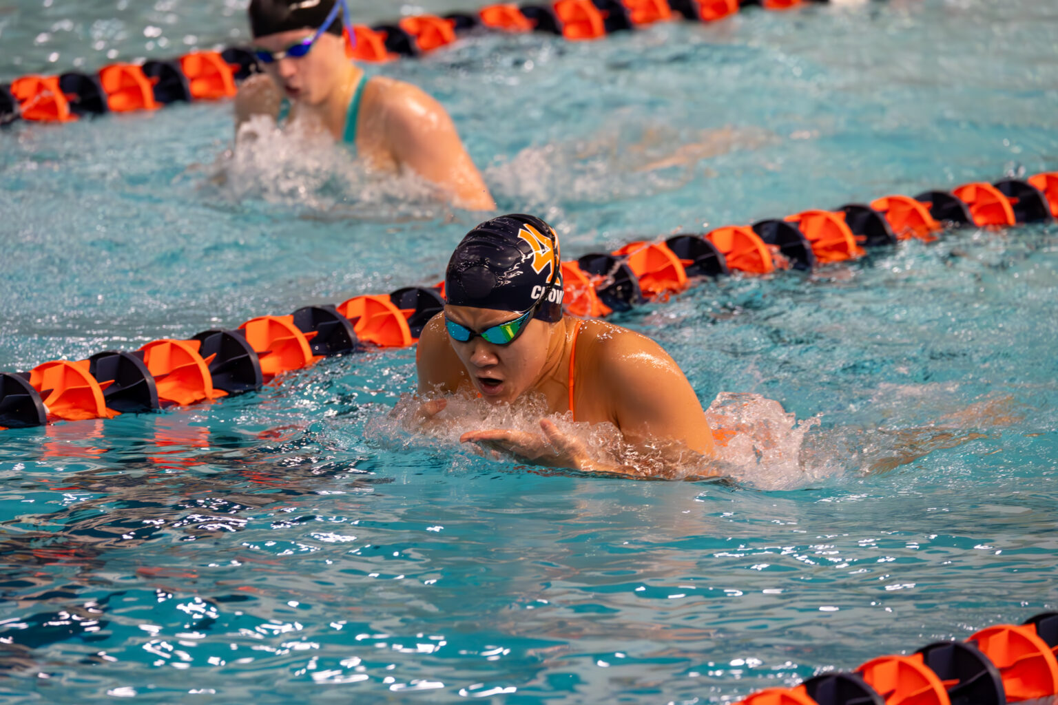 Young breaks through, sweeps girls swimming city titles; 13 entries ...