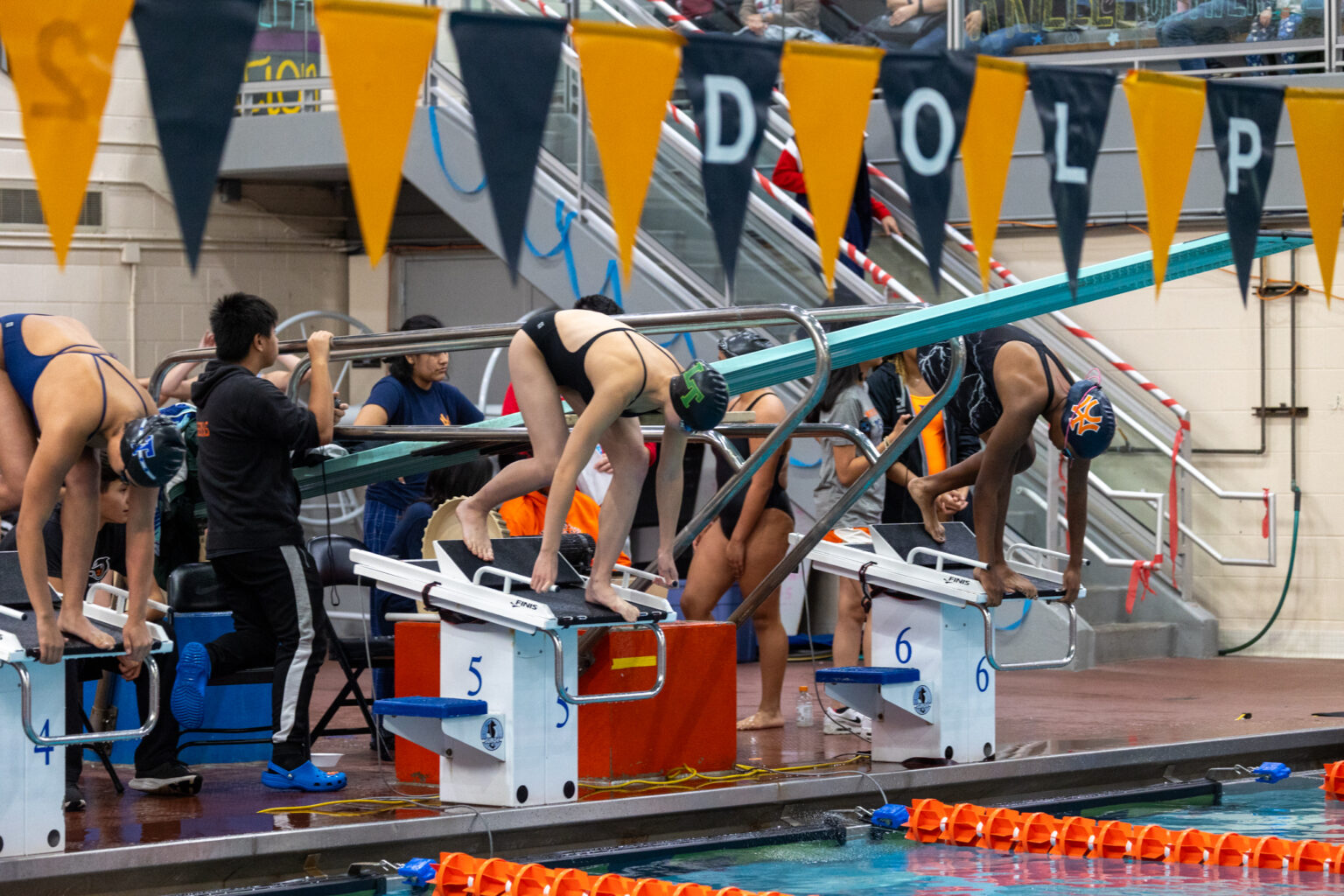 Young breaks through, sweeps girls swimming city titles; 13 entries ...