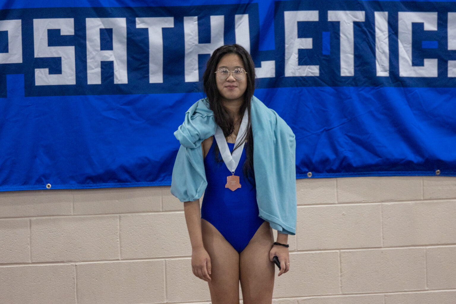 Young breaks through, sweeps girls swimming city titles; 13 entries ...